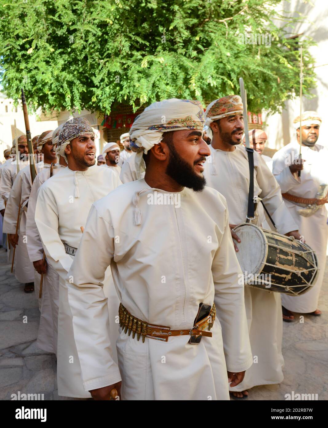 Traditional Omani sword dance in Nizwa fort, Oman Stock Photo - Alamy