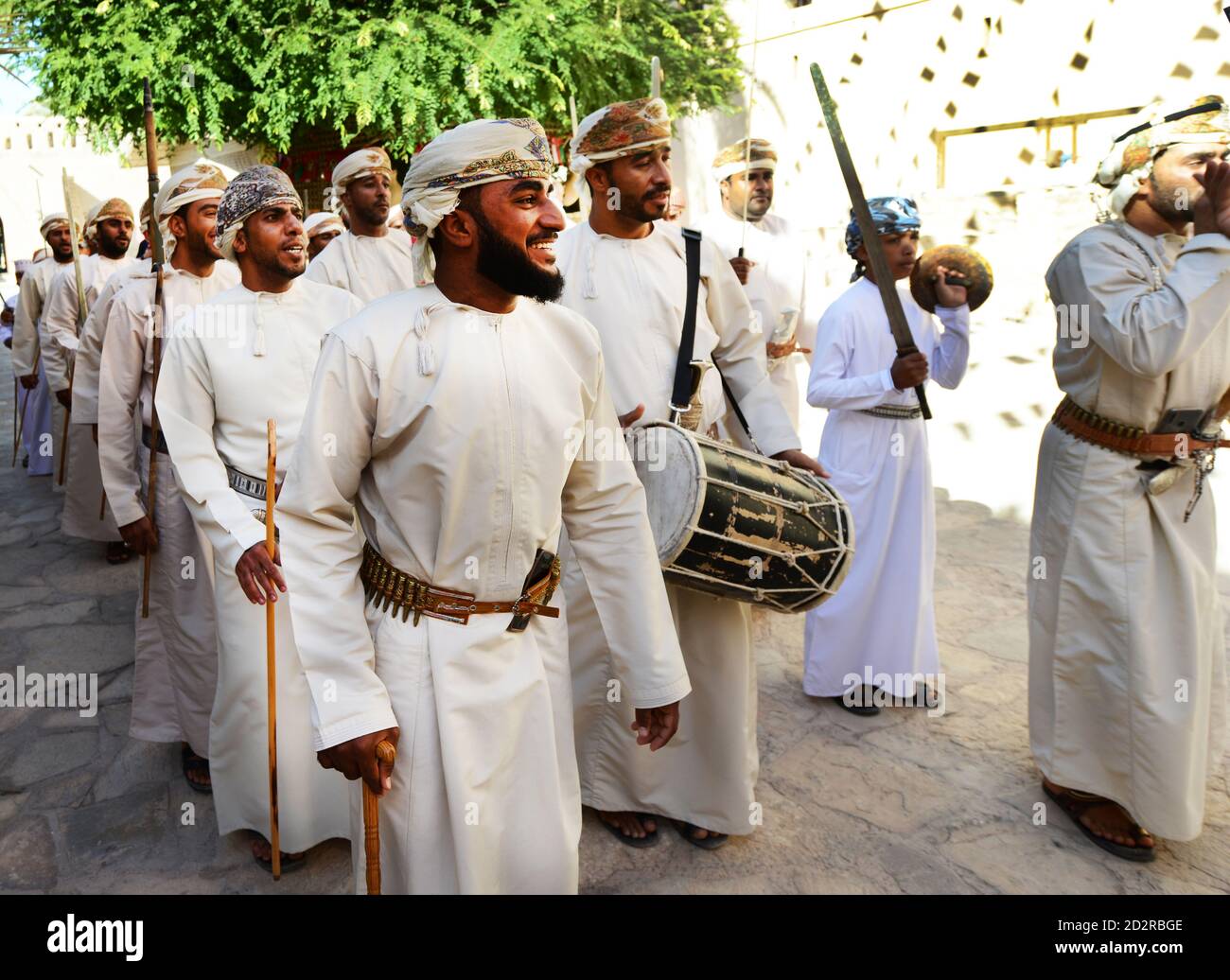Traditional Omani sword dance in Nizwa fort, Oman Stock Photo - Alamy
