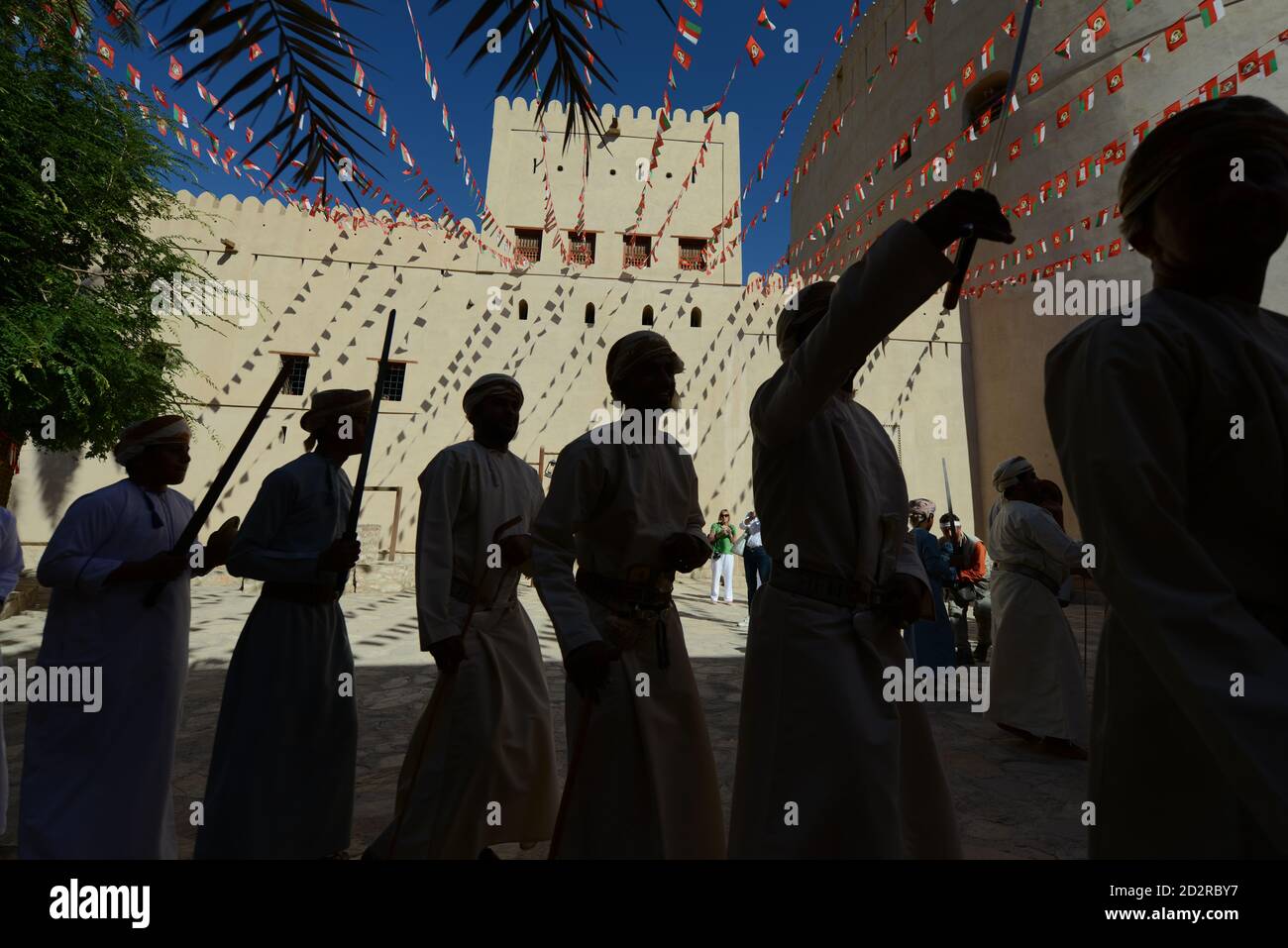 Traditional Omani sword dance in Nizwa fort, Oman Stock Photo - Alamy