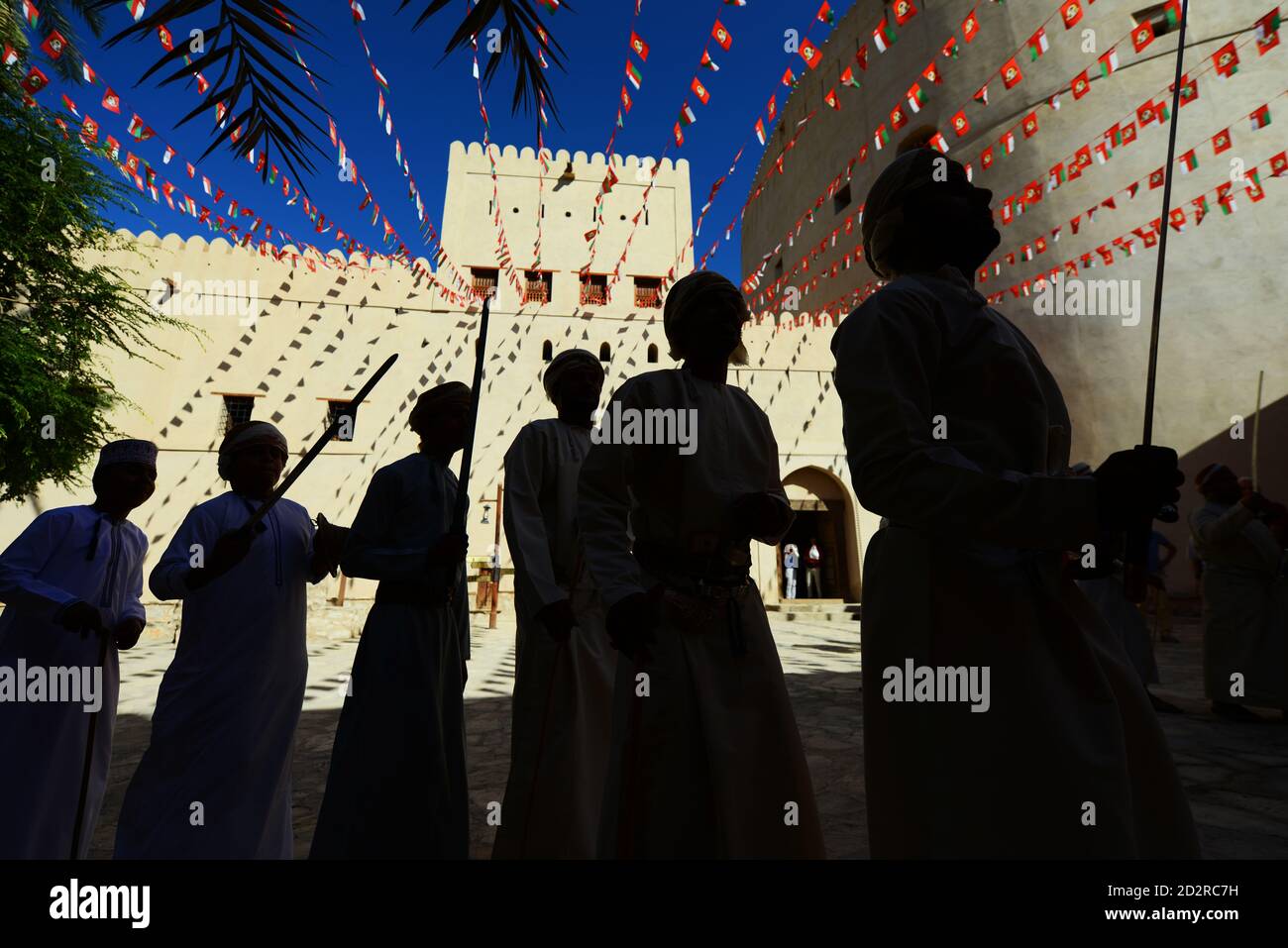 Traditional Omani sword dance in Nizwa fort, Oman Stock Photo - Alamy