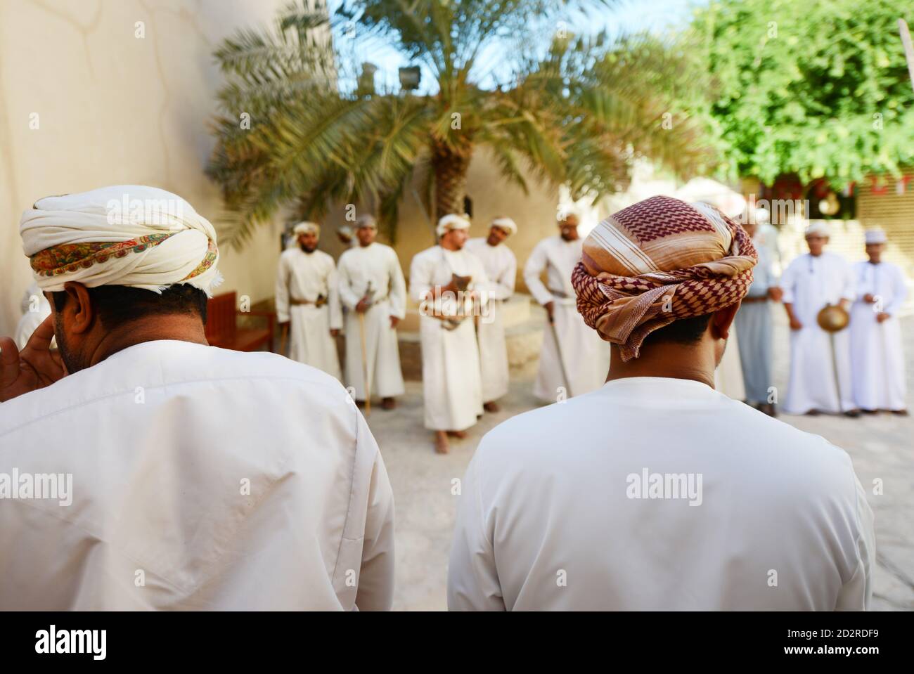 Traditional Omani sword dance in Nizwa fort, Oman Stock Photo - Alamy