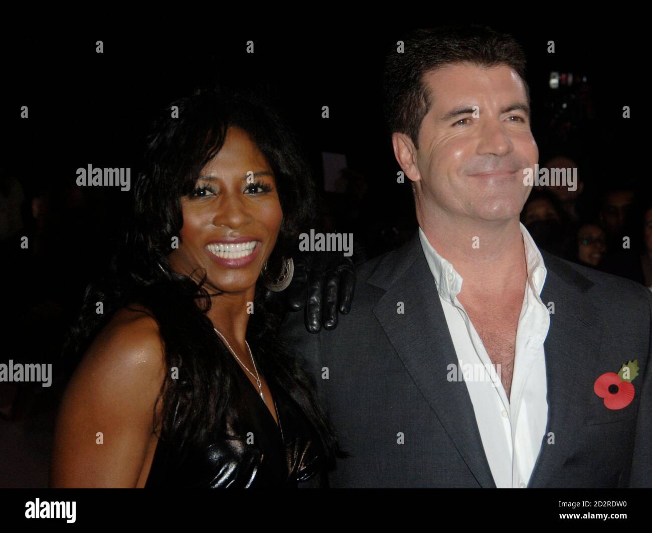 Singer sinitta simon cowell pose hi-res stock photography and images ...