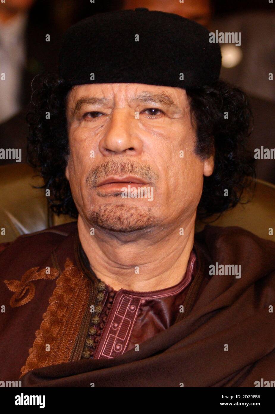 Libyan leader muammar gaddafi attends hi-res stock photography and ...