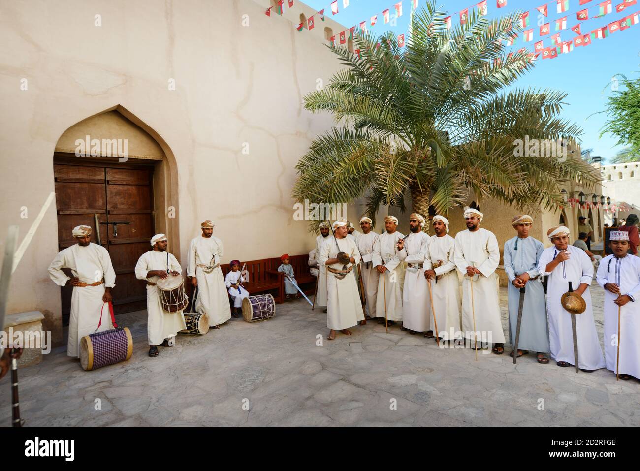Traditional Omani sword dance in Nizwa fort, Oman Stock Photo - Alamy