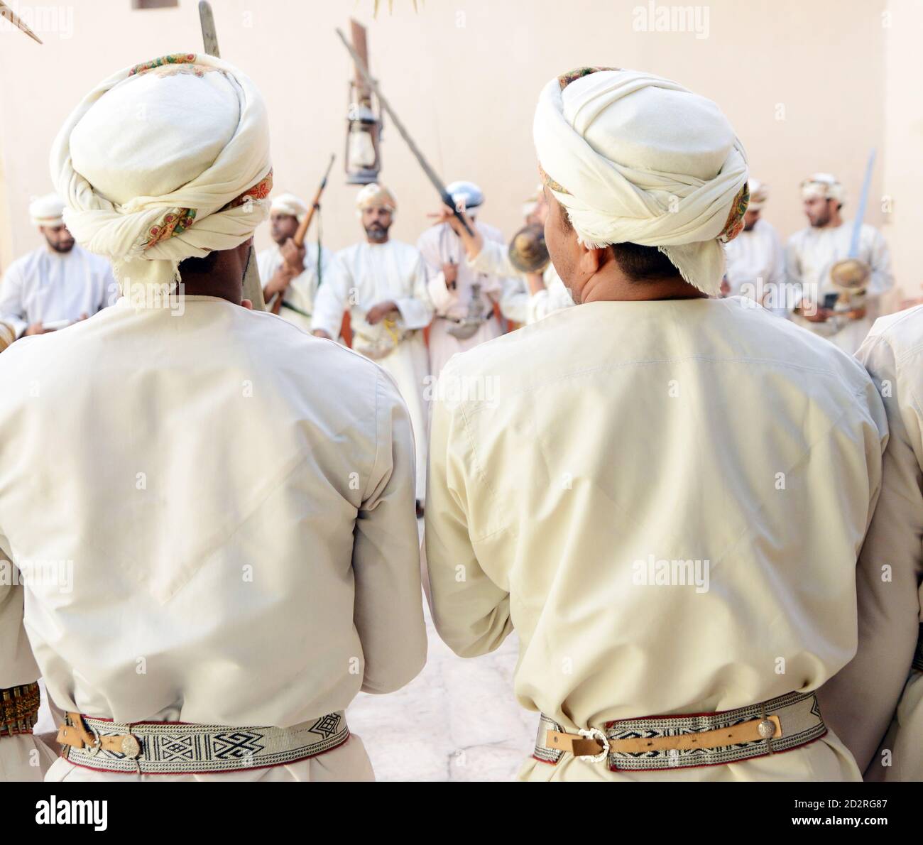 Traditional Omani sword dance in Nizwa fort, Oman Stock Photo - Alamy