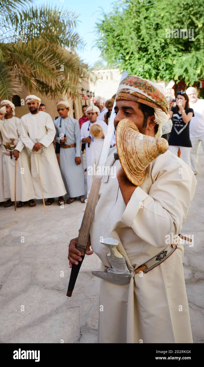 Traditional Omani sword dance in Nizwa fort, Oman Stock Photo - Alamy