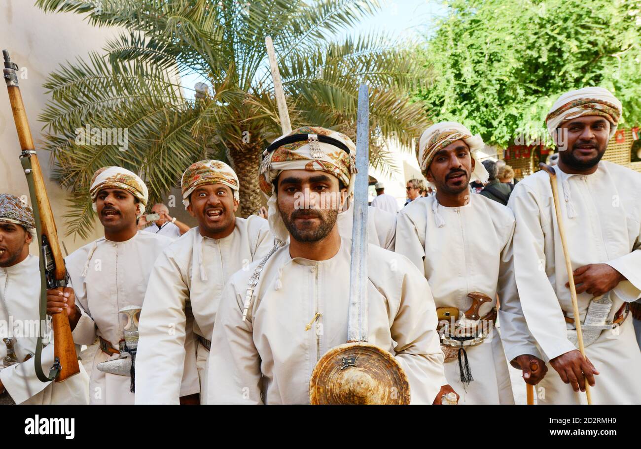 Traditional Omani sword dance in Nizwa fort, Oman Stock Photo - Alamy