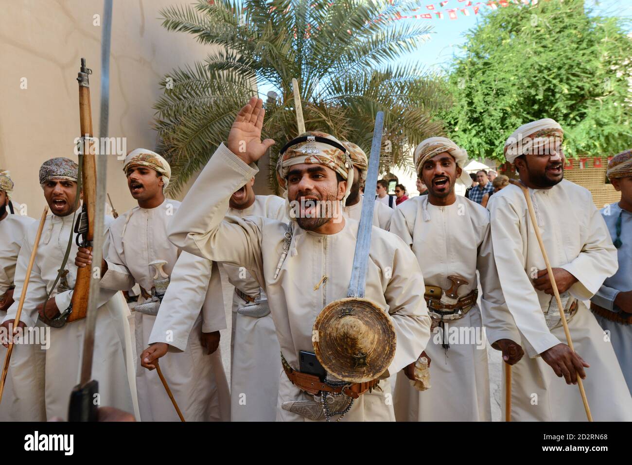 Traditional Omani sword dance in Nizwa fort, Oman Stock Photo - Alamy