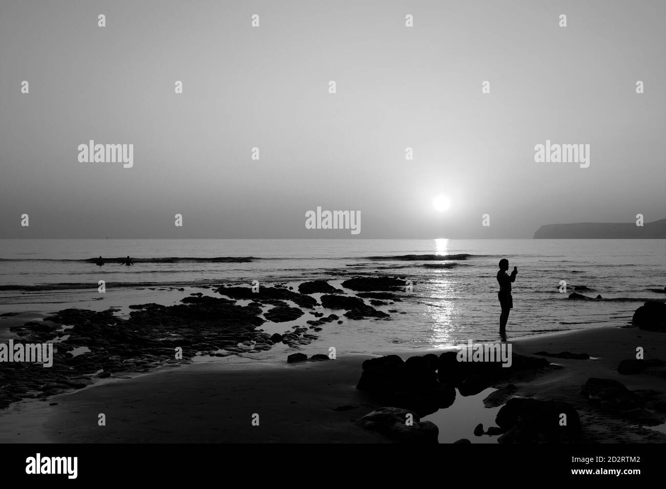 Taking a photo at sunset Compton Bay Isle of Wight Stock Photo - Alamy