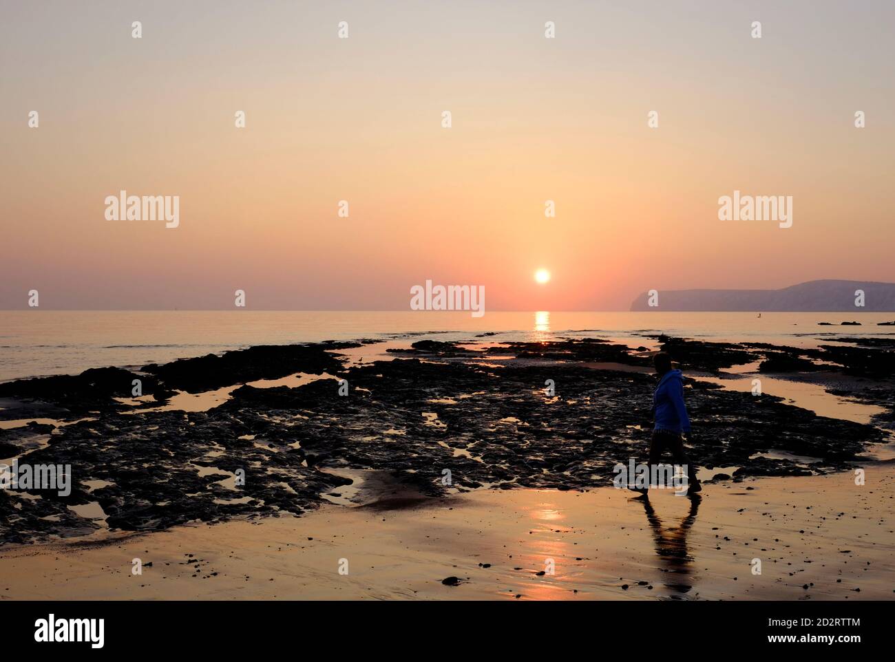 Going for a stroll at sunset Compton Bay Isle of Wight Stock Photo - Alamy