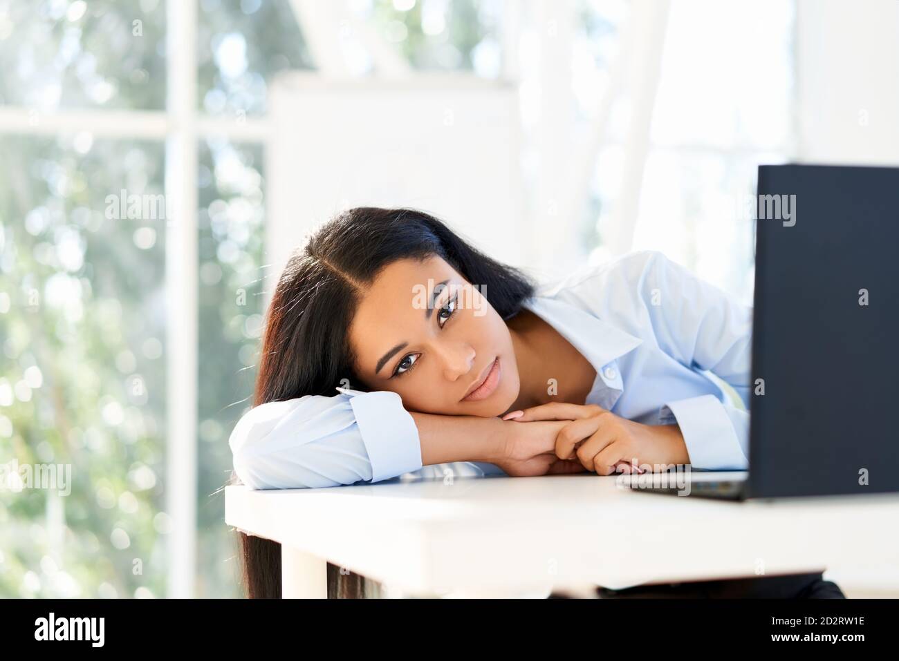 Tired overworked businesswoman relax on the workplace on office desk ...