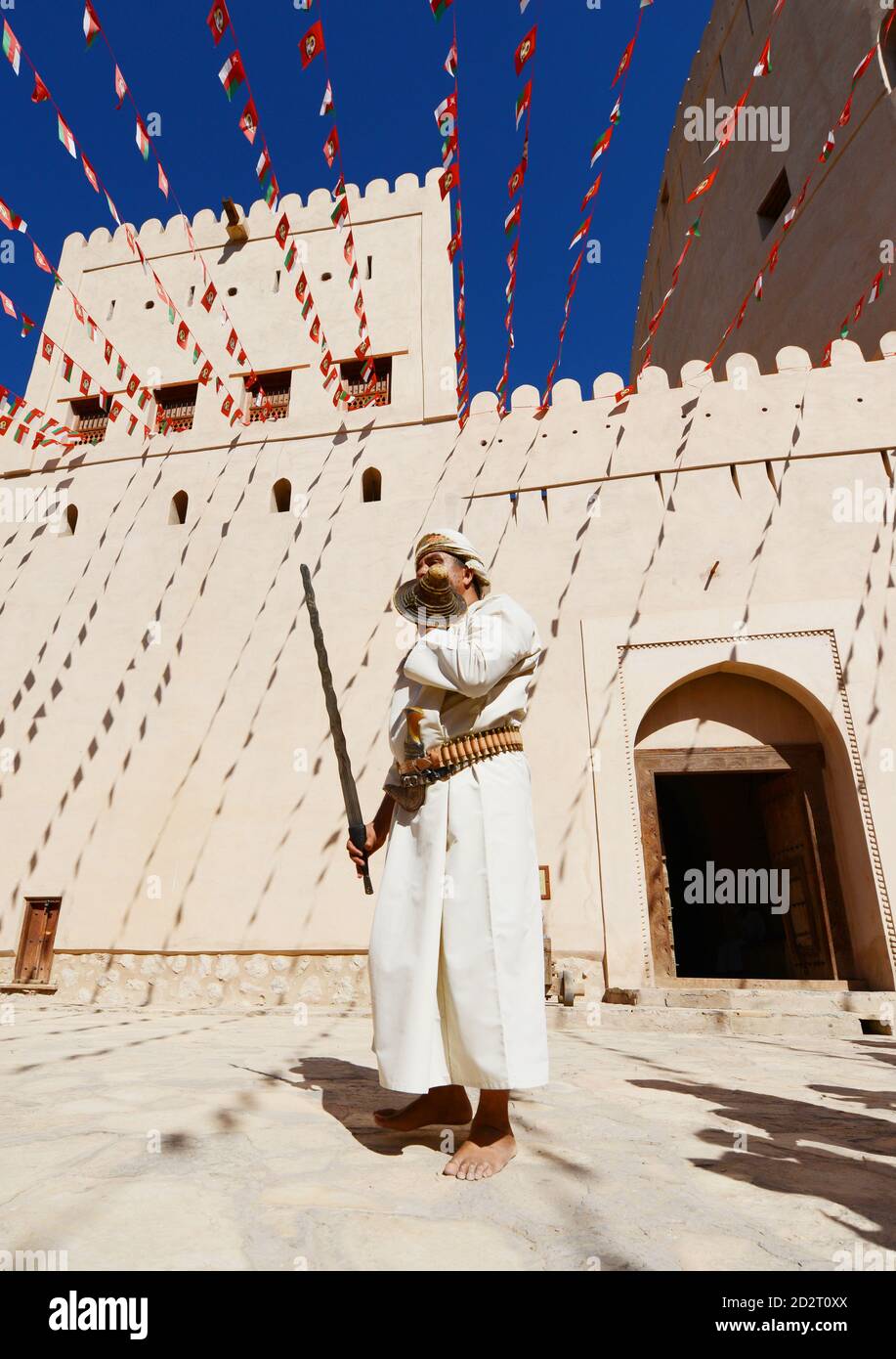 Traditional Omani sword dance in Nizwa fort, Oman Stock Photo - Alamy