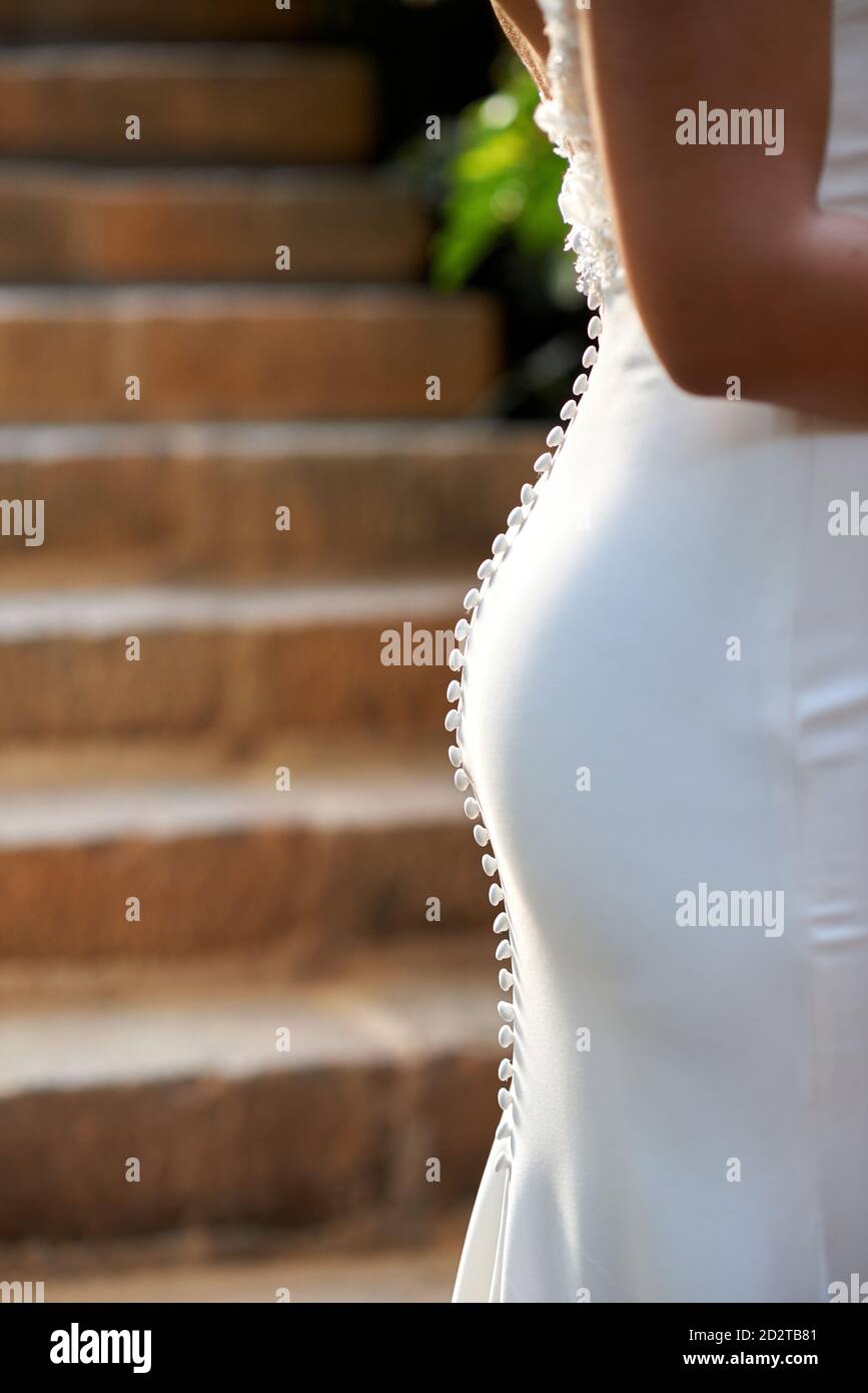 Back view of unrecognizable crop curvy bride wearing white elegant ...