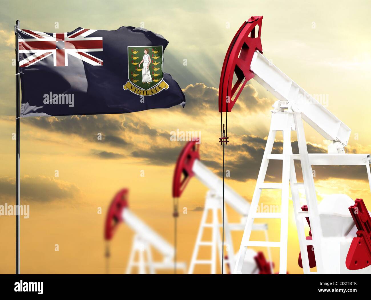 Oil rigs against the backdrop of the colorful sky and a flagpole with ...