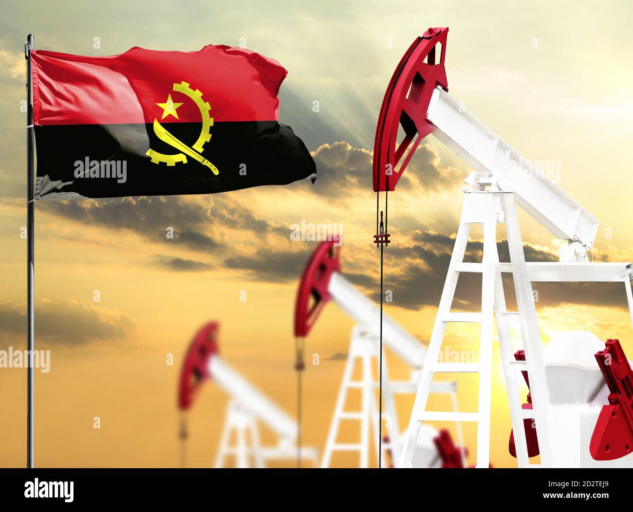 Oil rigs against the backdrop of the colorful sky and a flagpole with ...