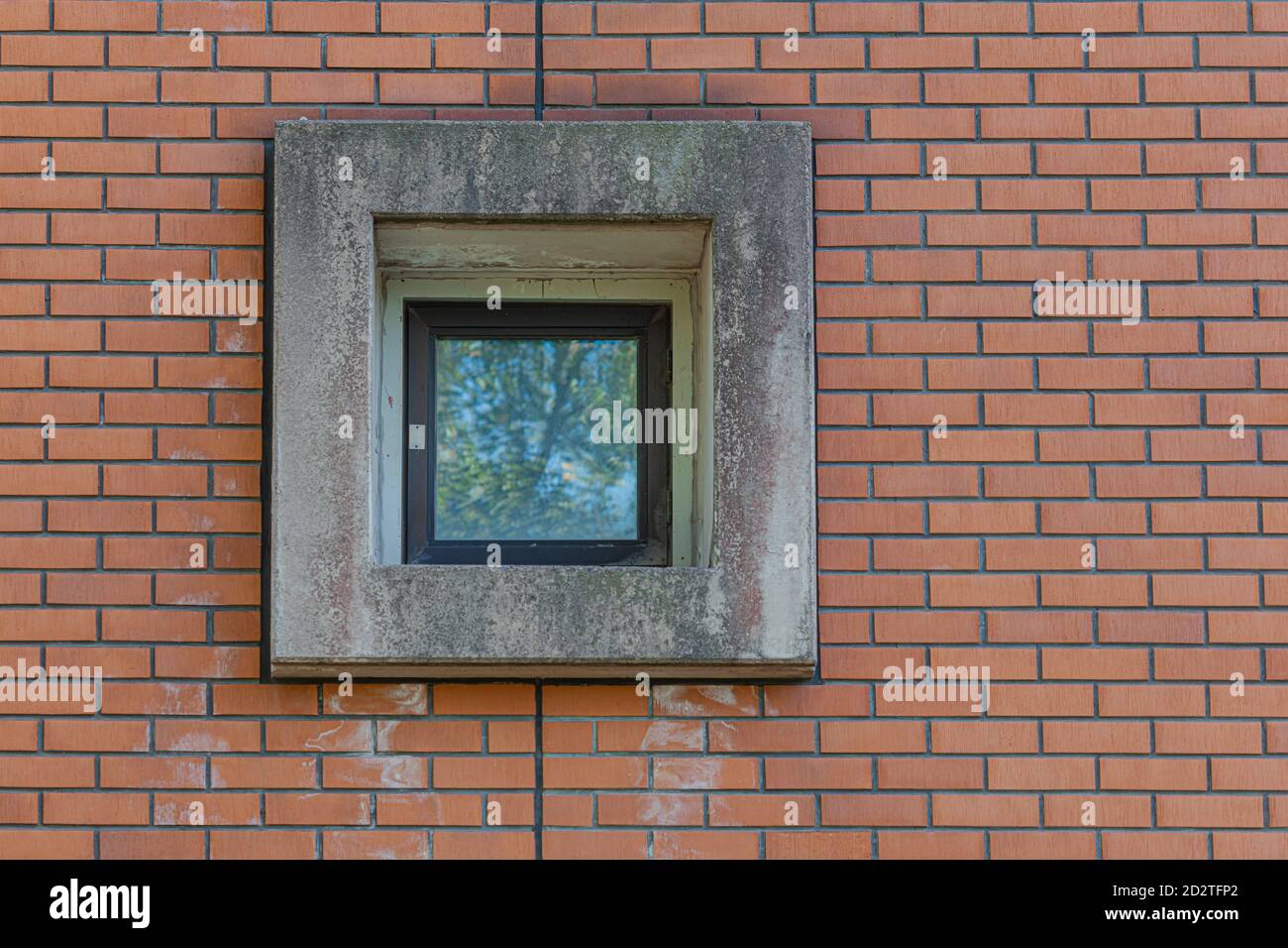 Small window in a red brick wall. High quality photo Stock Photo - Alamy