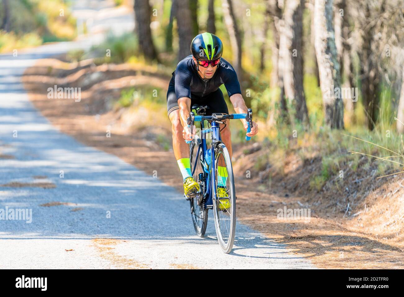 Cyclist on curvy mountain hi-res stock photography and images - Alamy