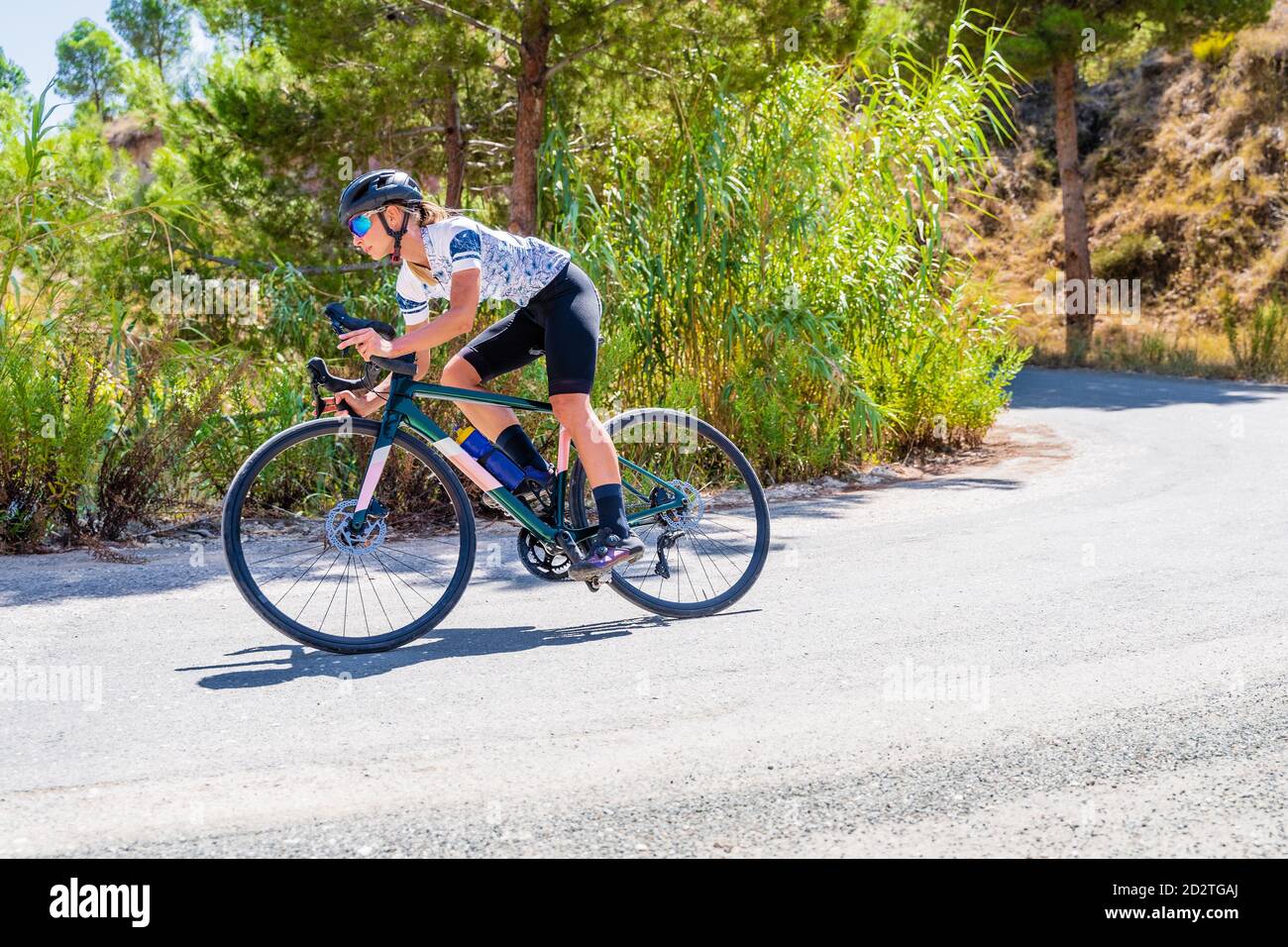 Cyclist on curvy mountain hi-res stock photography and images - Alamy