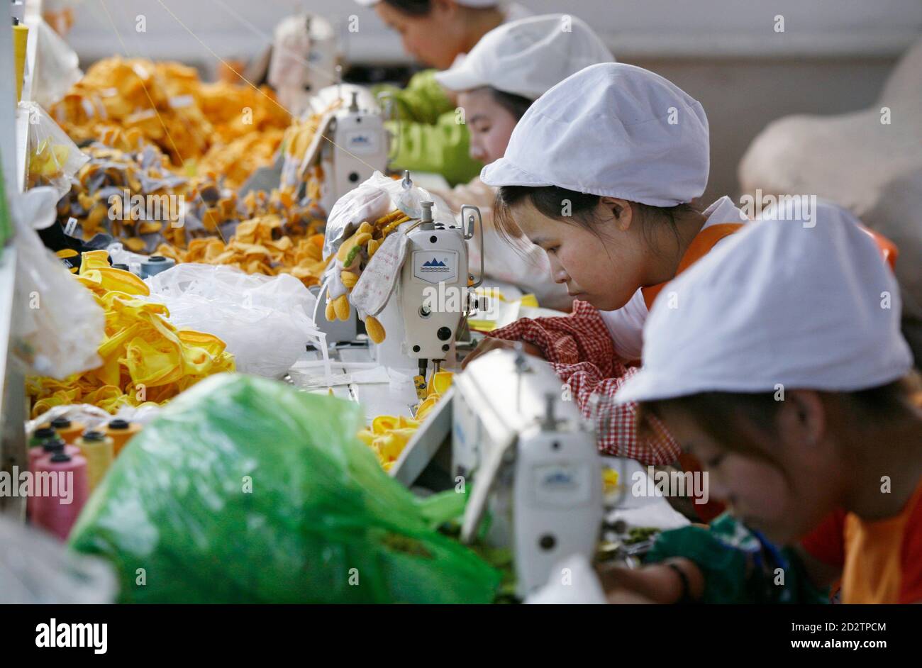 China toy factory workers hi-res stock photography and images - Alamy