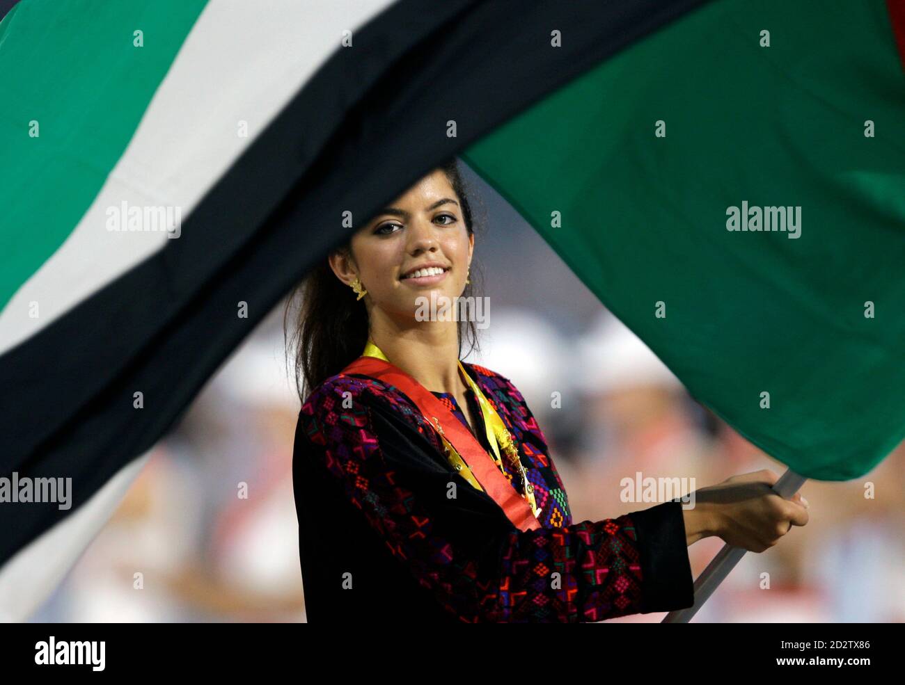 Flag bearer holds olympic flag hi-res stock photography and images - Alamy