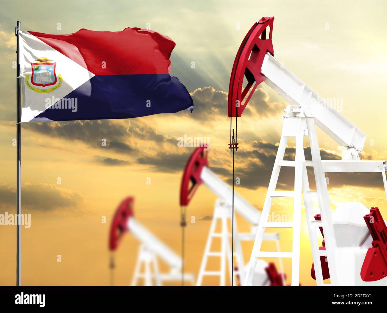 Oil rigs against the backdrop of the colorful sky and a flagpole with ...