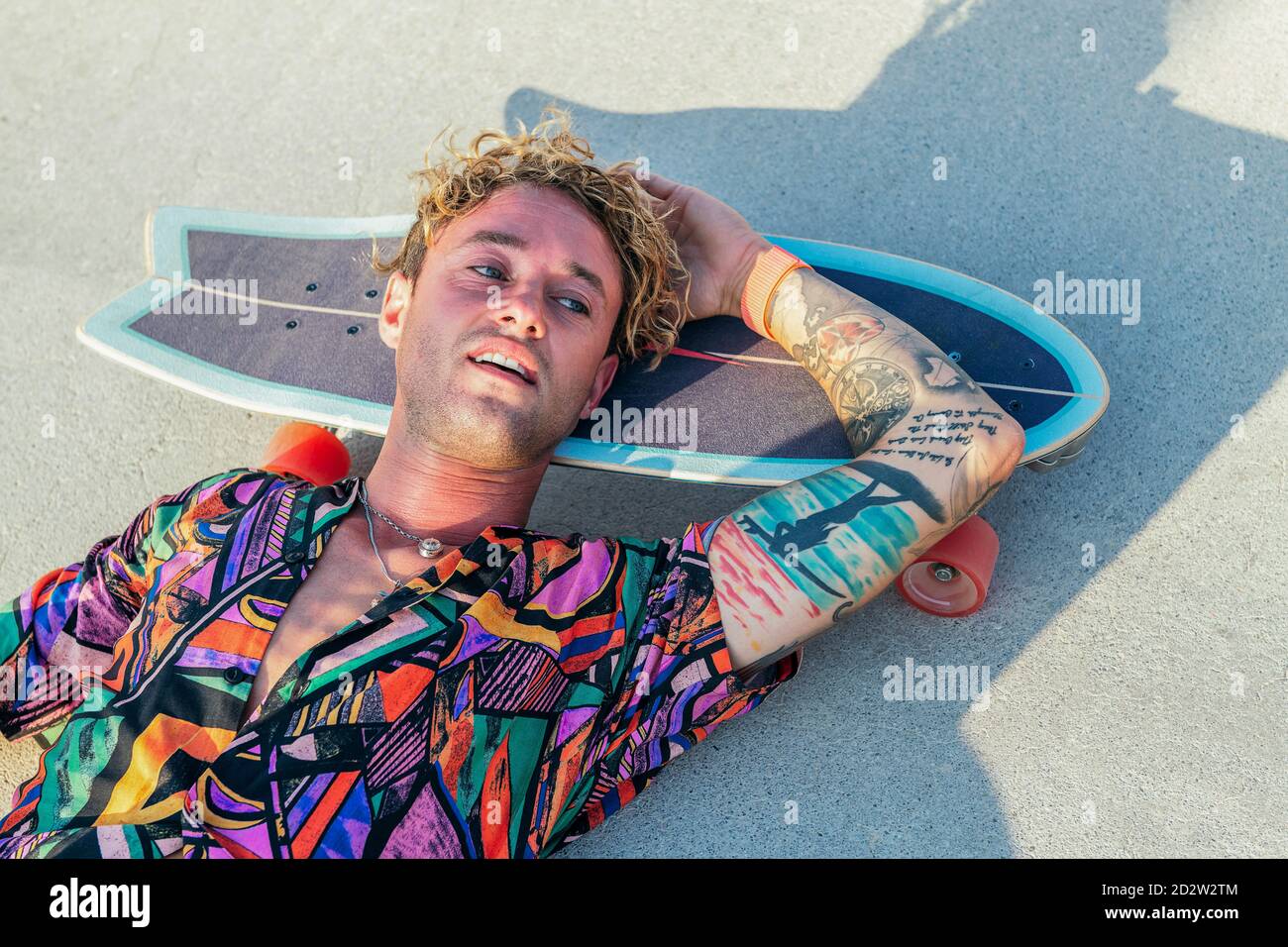 Down lying skateboarder skate hi-res stock photography and images - Alamy