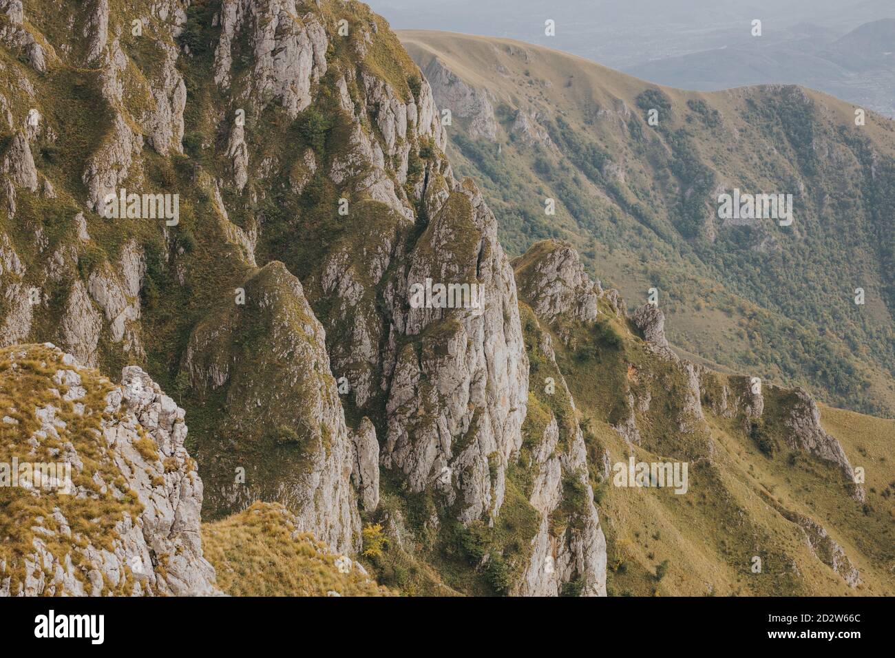 View of rocky mountains in Vlasic, Bosnia on a gloomy day Stock Photo ...