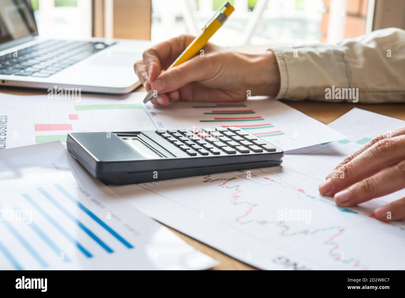 desk table with analysis chart or graph Stock Photo - Alamy