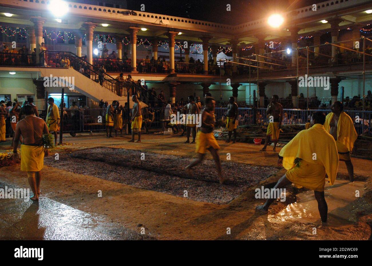 Fire walking singapore hi-res stock photography and images - Alamy