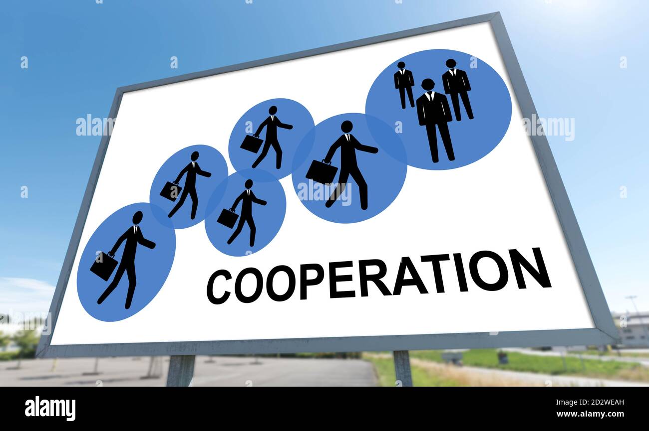 Cooperation concept drawn on a billboard Stock Photo - Alamy