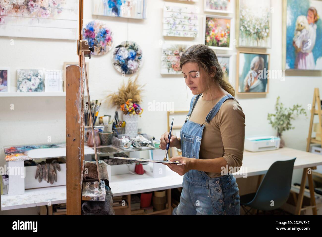 Female painter drawing picture in hi-res stock photography and images - Alamy