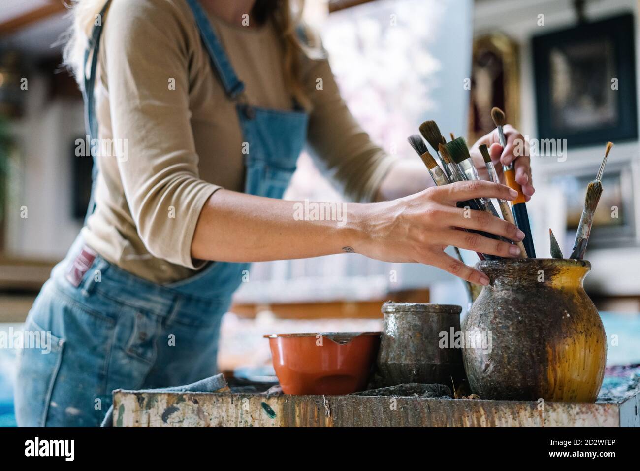 Artist with paintbrush hi-res stock photography and images - Alamy