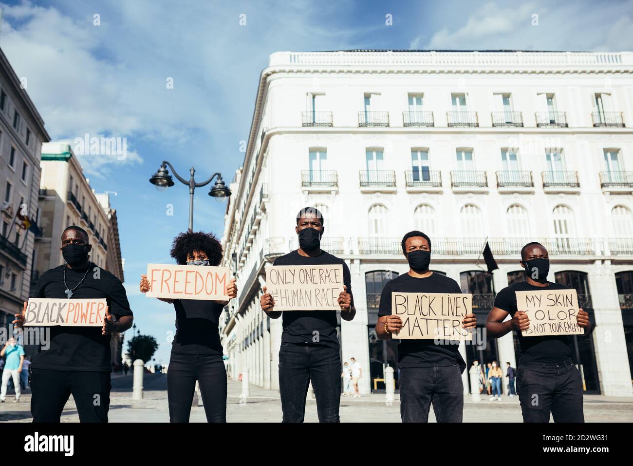 Racial equality fist hi-res stock photography and images - Alamy