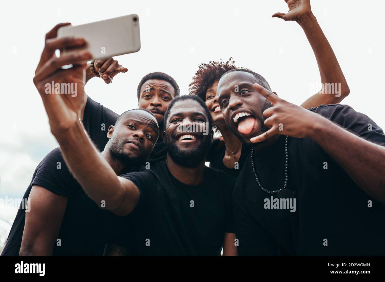 Group of black race friends taking a selfie Stock Photo - Alamy