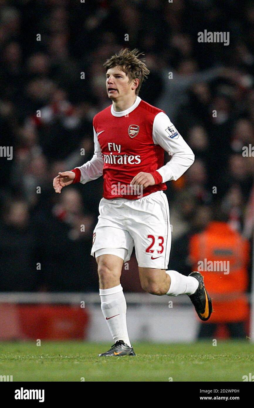 Arsenal's Andrey Arshavin (right) celebrates after scoring his team's ...