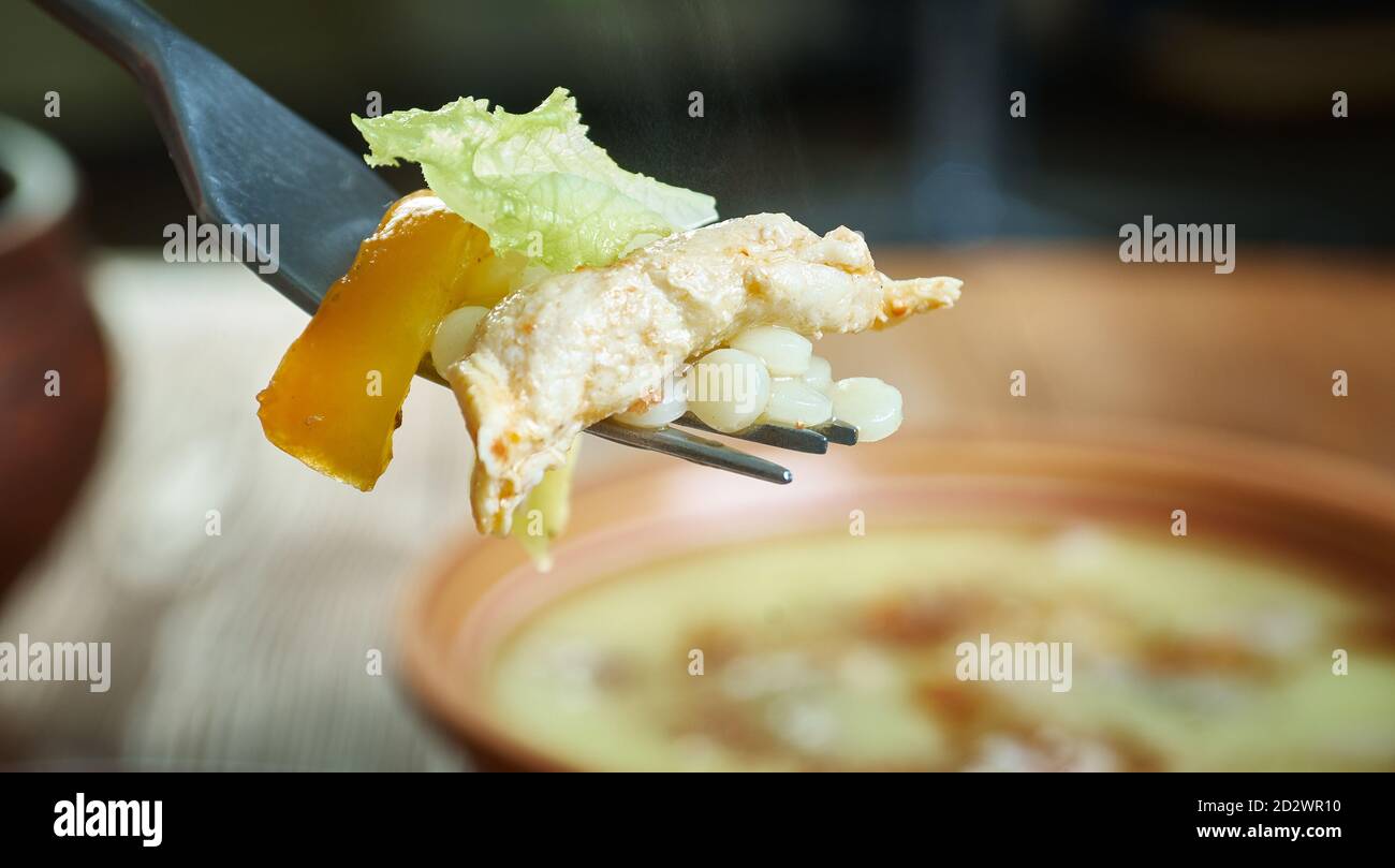 Israel Ptitim casserole with chicken and vegetables . Middle Eastern ...