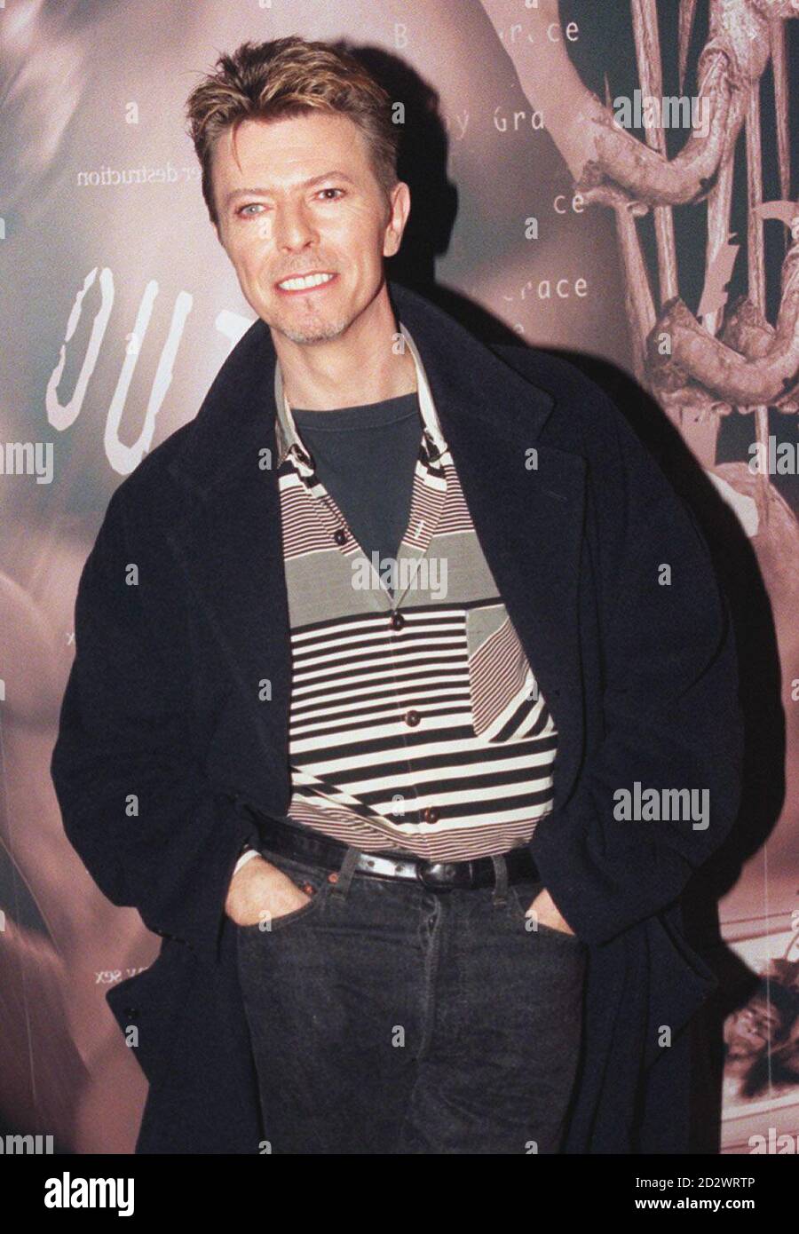 Rock singer David Bowie poses after a news confrence in London Stock ...