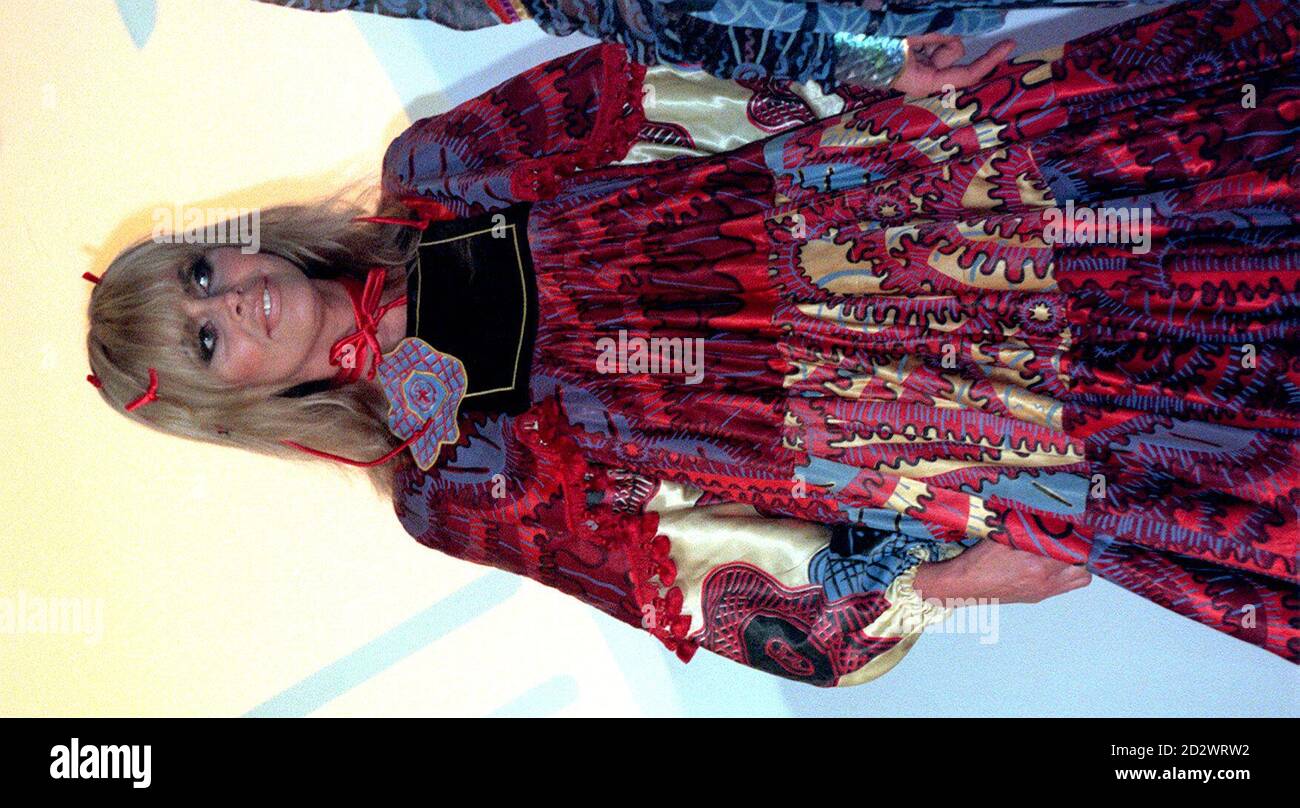 Actress Britt Ekland models a creation by British Designer Zandra ...