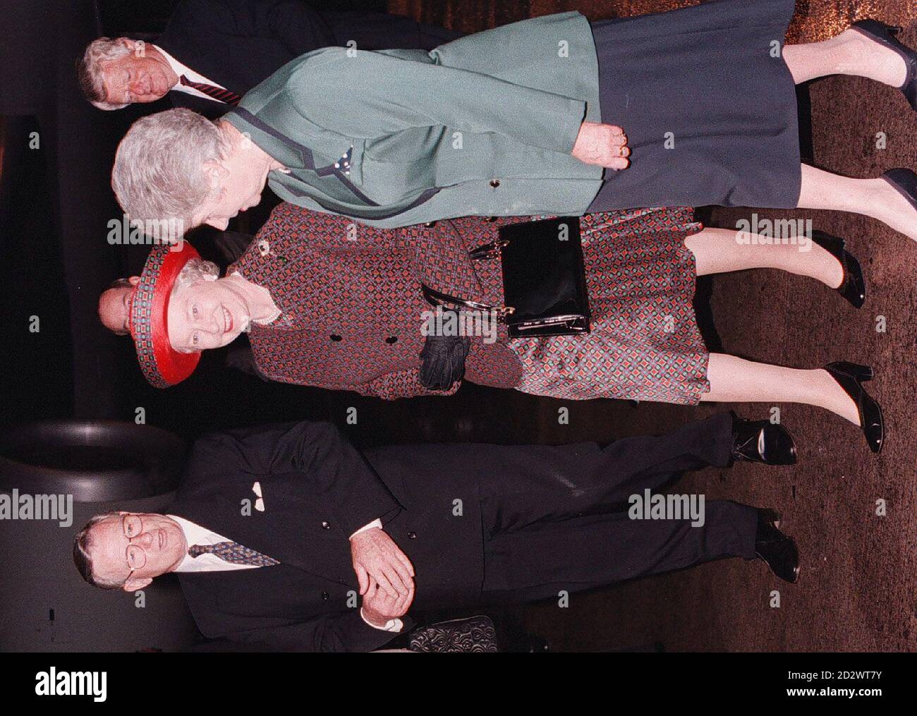 The Queen makes her way to a Royal New Zealand Air Force plane, while ...