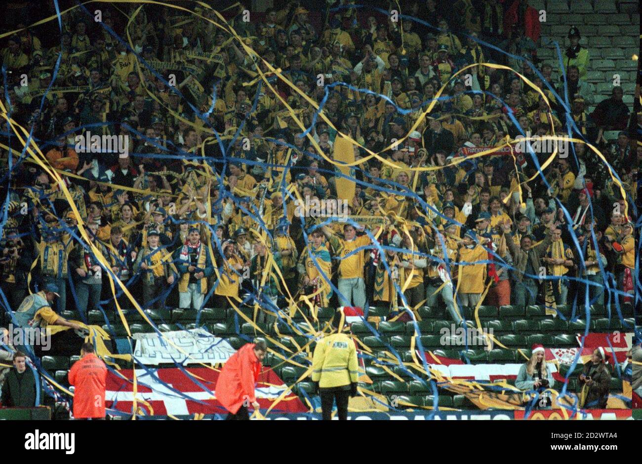 The Brondby fans provide a colourful welcome for their team at Anfield ...