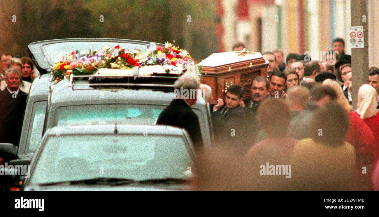 David Ungi's coffin is taken to the hearse in Blytheswood Street ...