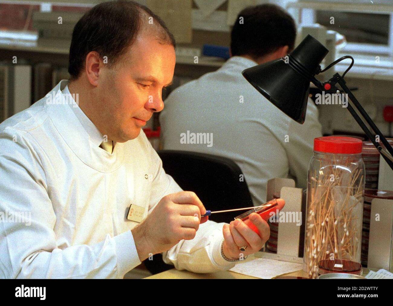 Public Health laboratory officer Keith Carter tests meningitis samples ...