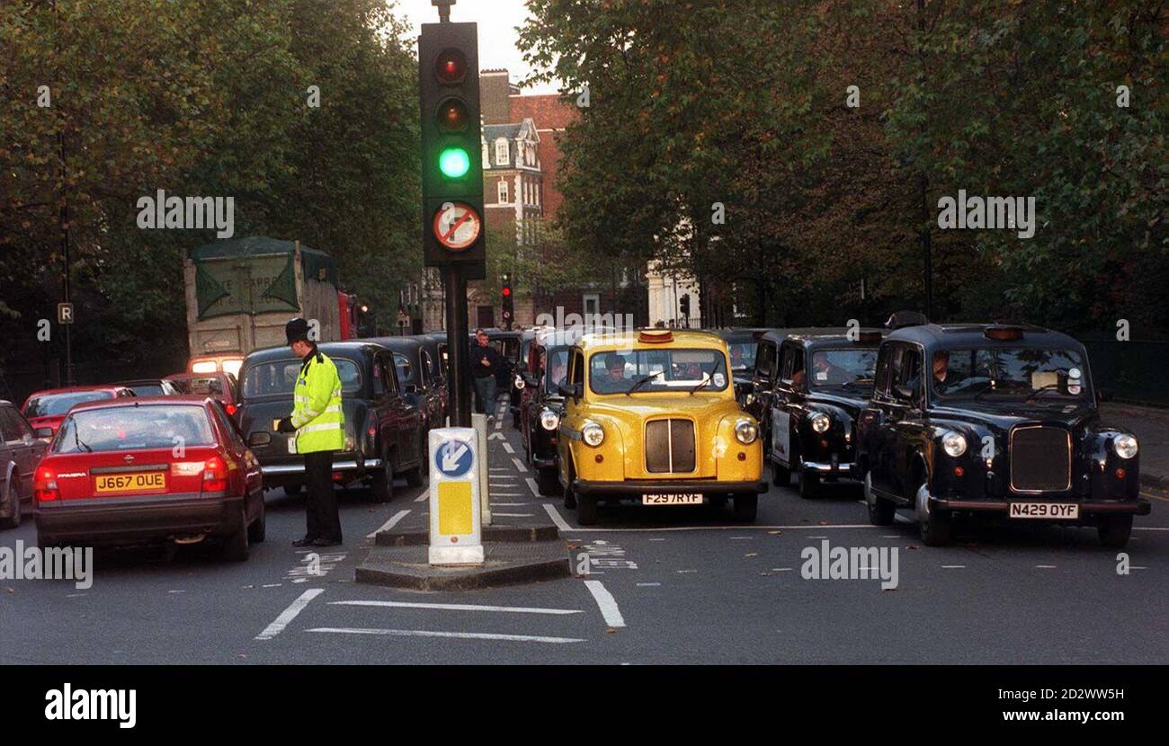 Some of the 5,000 black cabs demonstrating in Victoria, London over ...