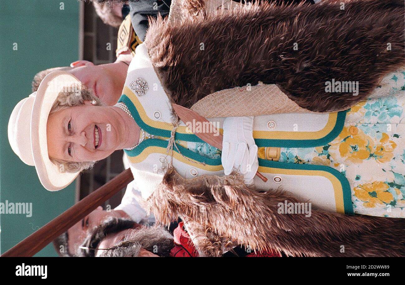 The queen wearing a kiwi feather maori cape hi-res stock photography ...