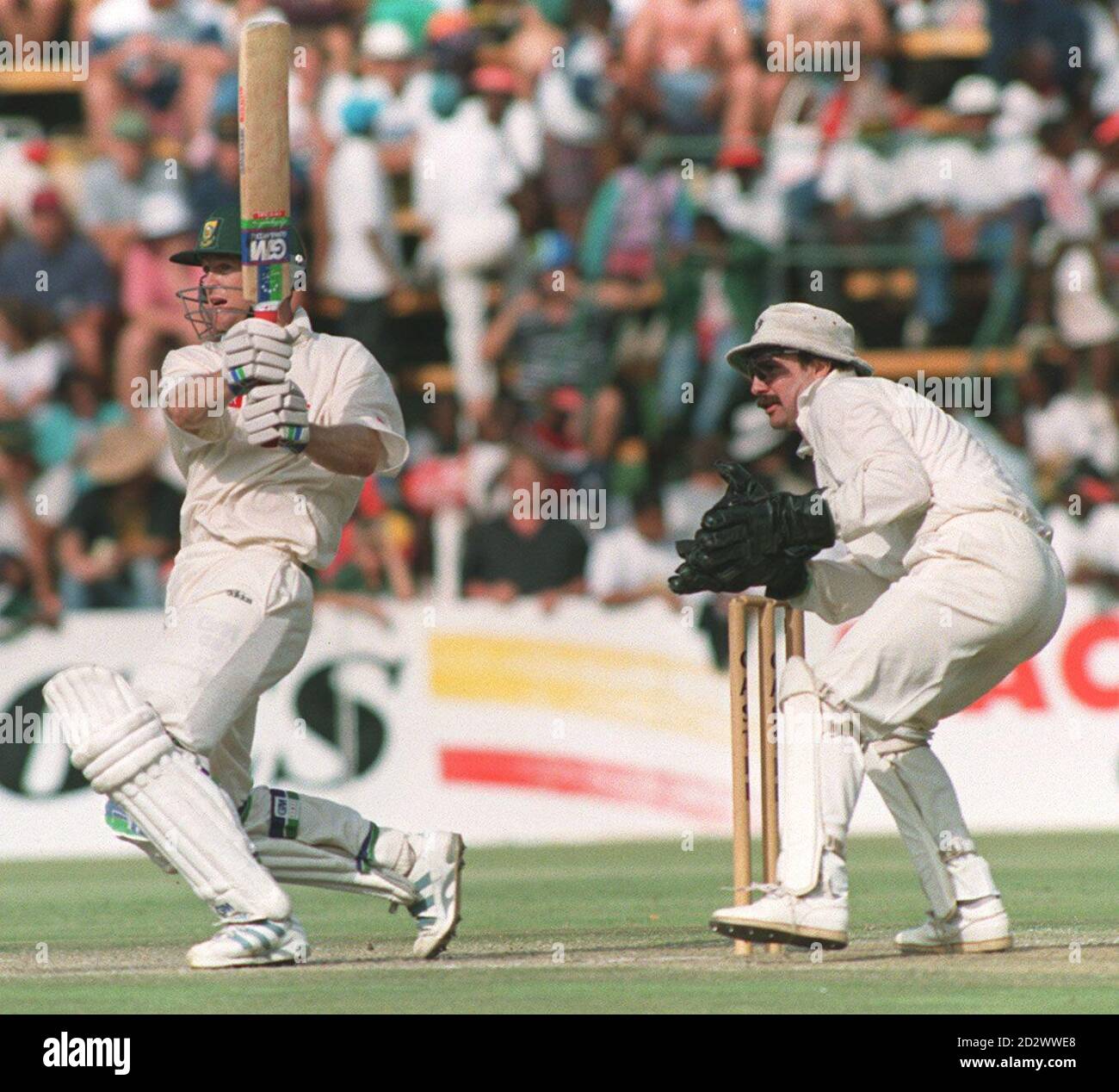 England wicketkeeper Jack Russell (right) waits in vain as South Africa ...