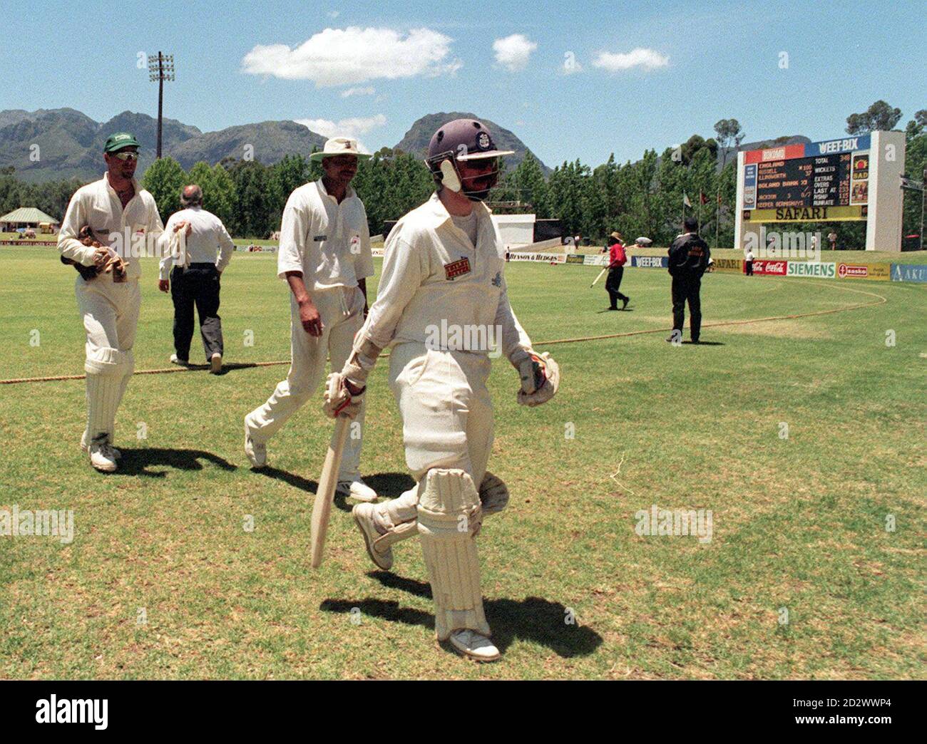 England's Jack Russell heads for the pavillion and lunch after reaching ...