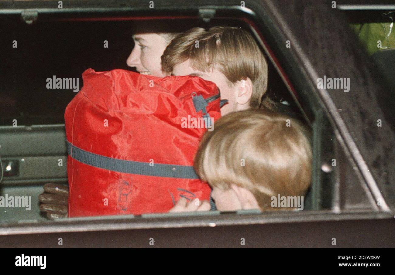 Prince William shields his face with a bag, to stop photographers ...