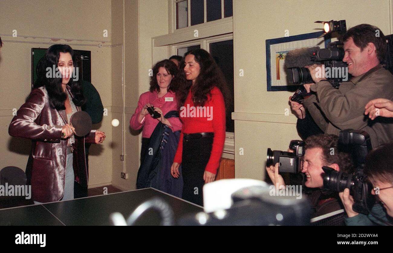 Superstar singer/actress Cher plays table tennis with residents of the ...