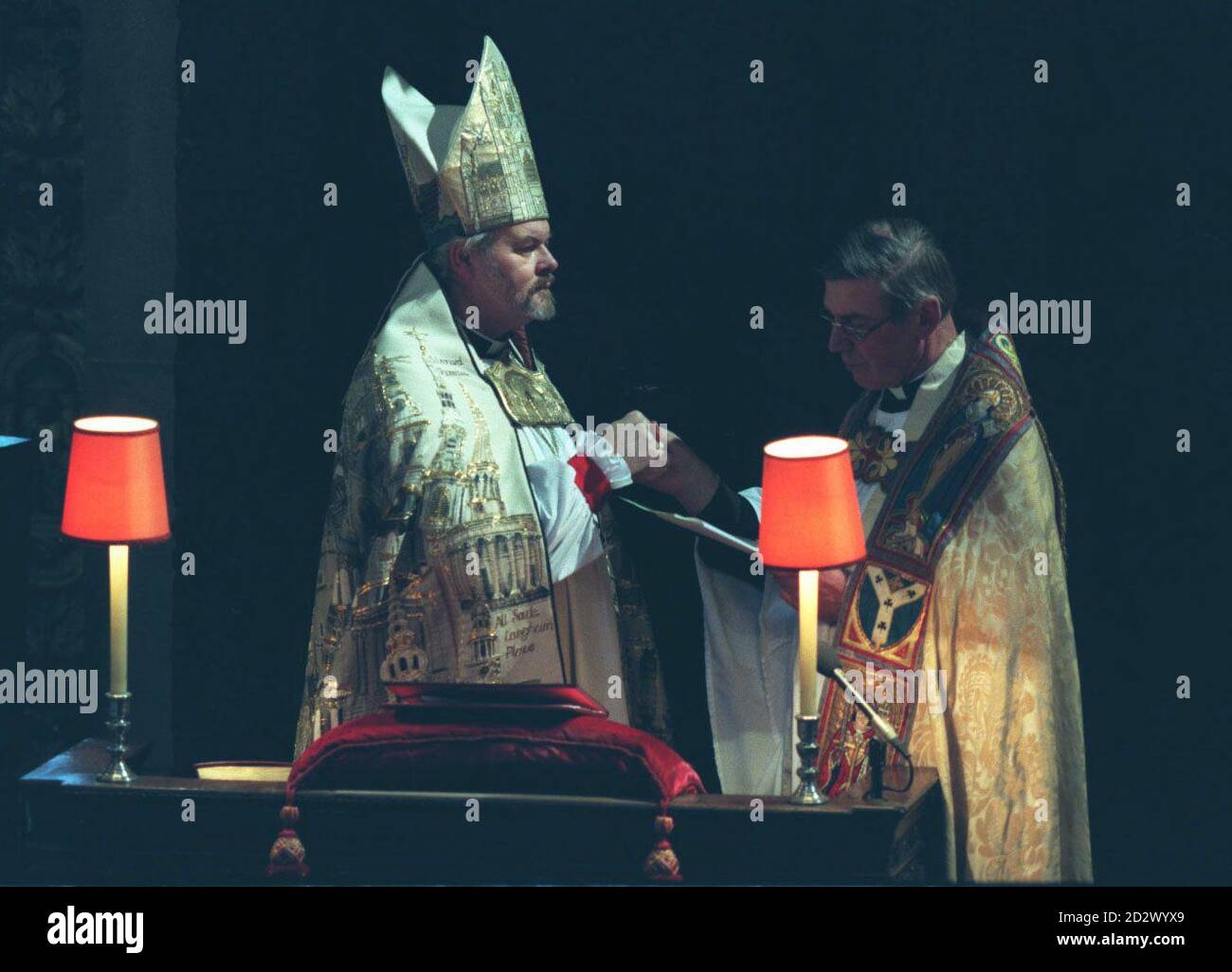 The Rt. Revd. Richard Chartres (left) in the robes of the Bishop of ...