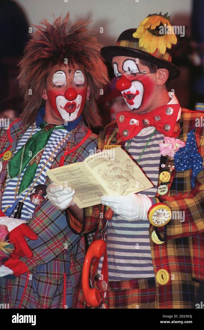 Two of the congregation join in the hymn singing at the 50th annual ...